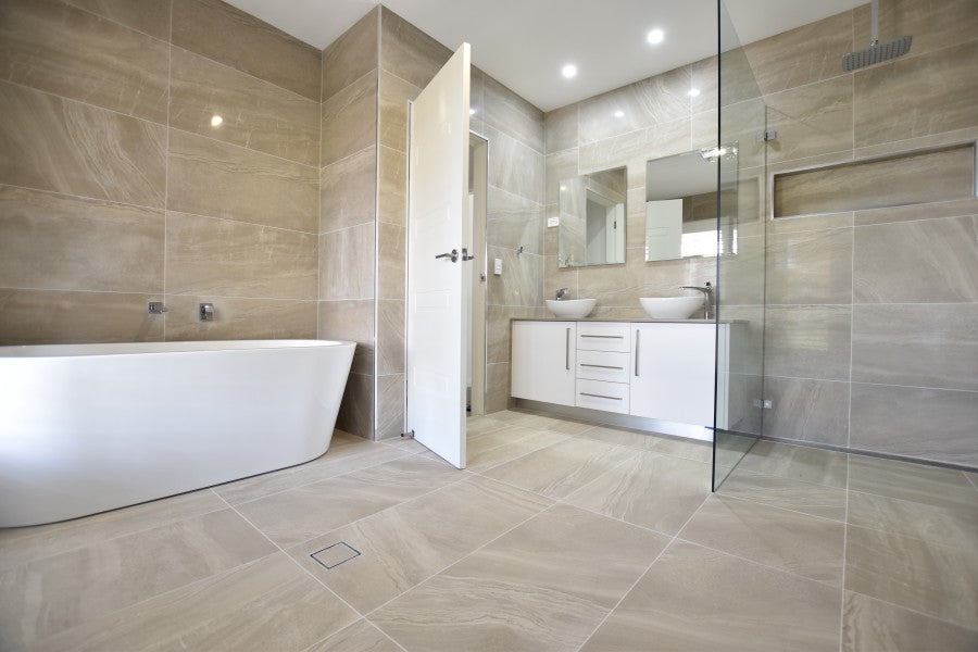 #35 - Bathrooms: A massive taupe walnut look tile run throughout! — ATS ...