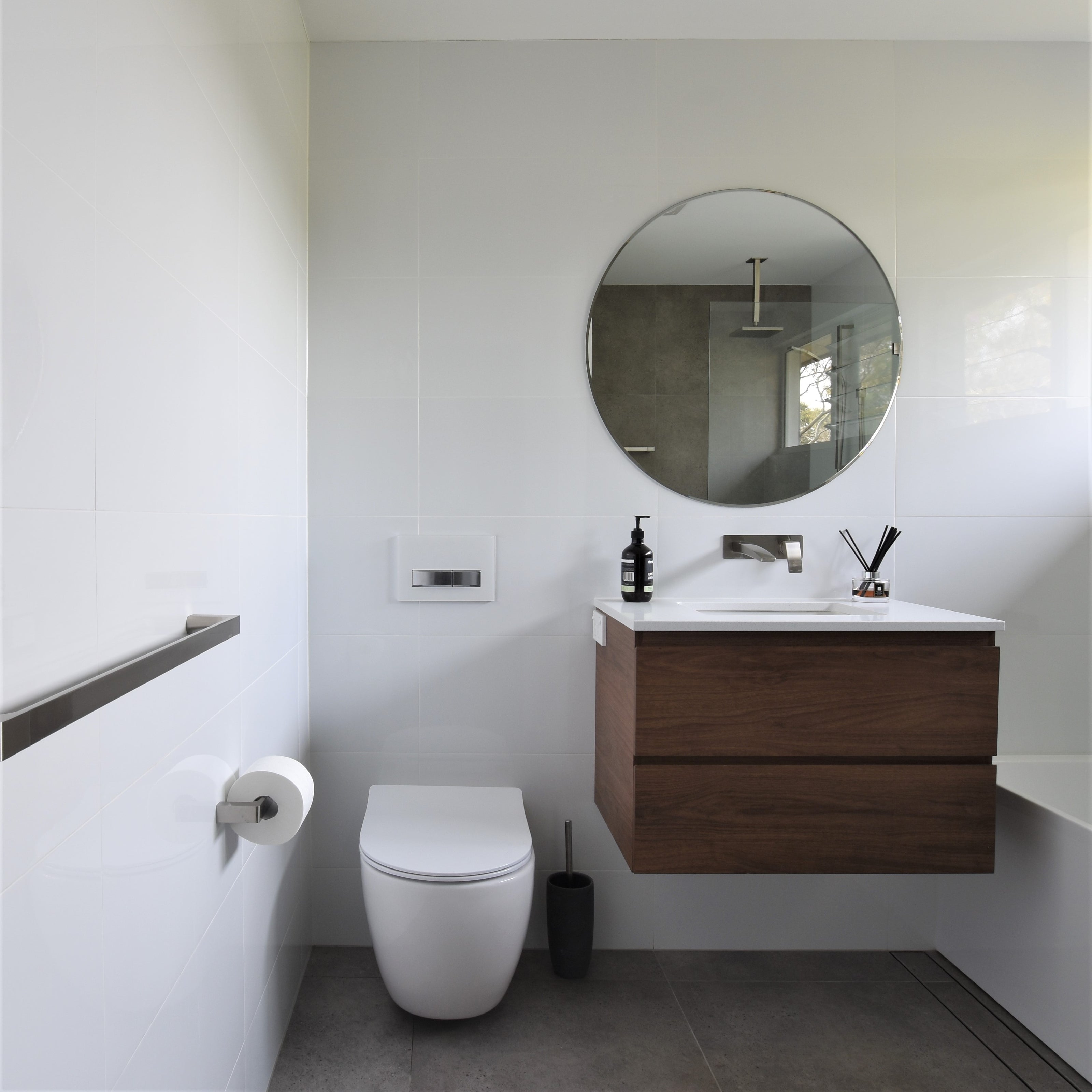 #82 - Bathrooms: Concrete grey with timber coloured vanity and all-whi ...